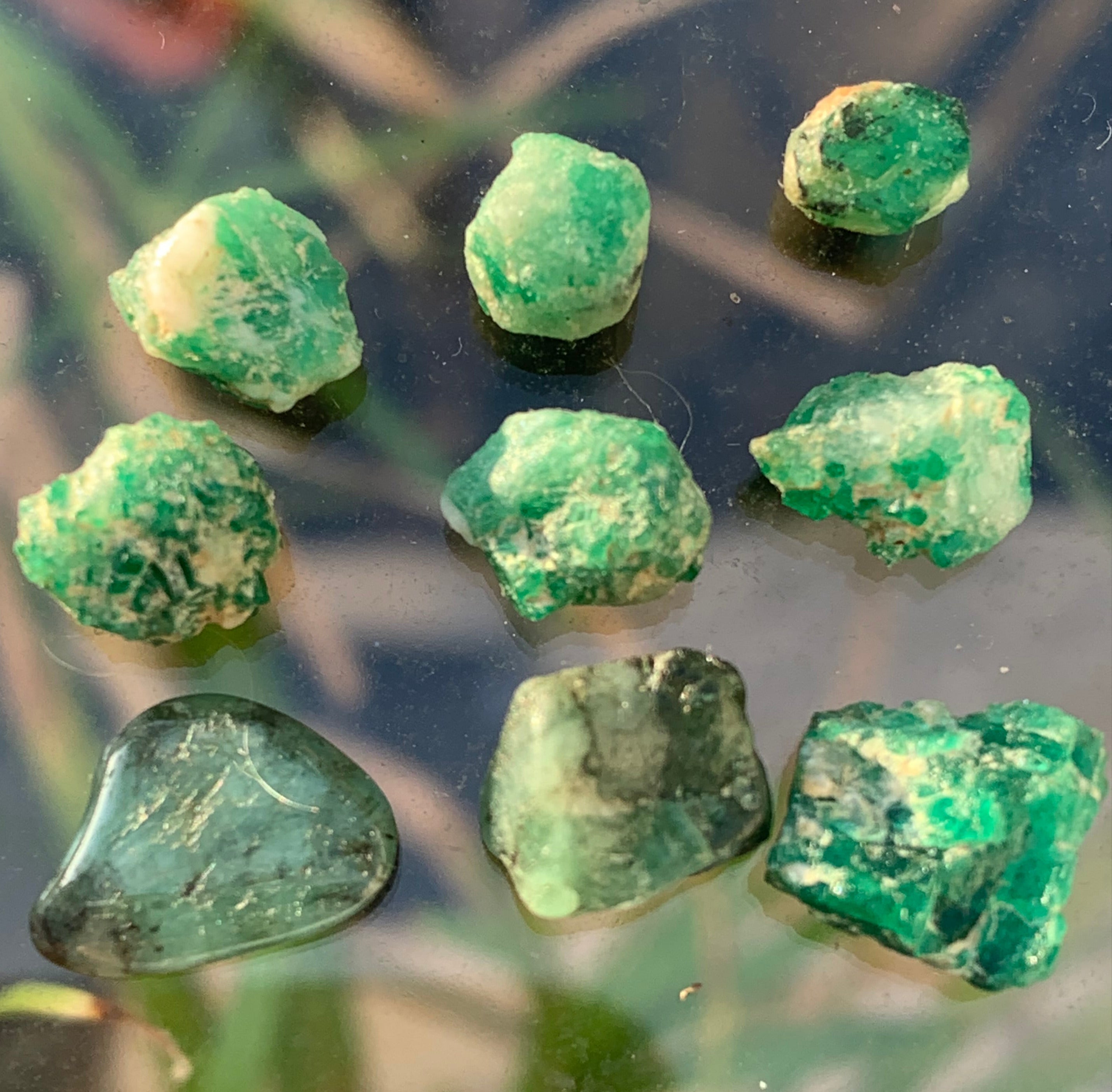 Emerald, rough pieces sold in lots or individually, size of approximat ...